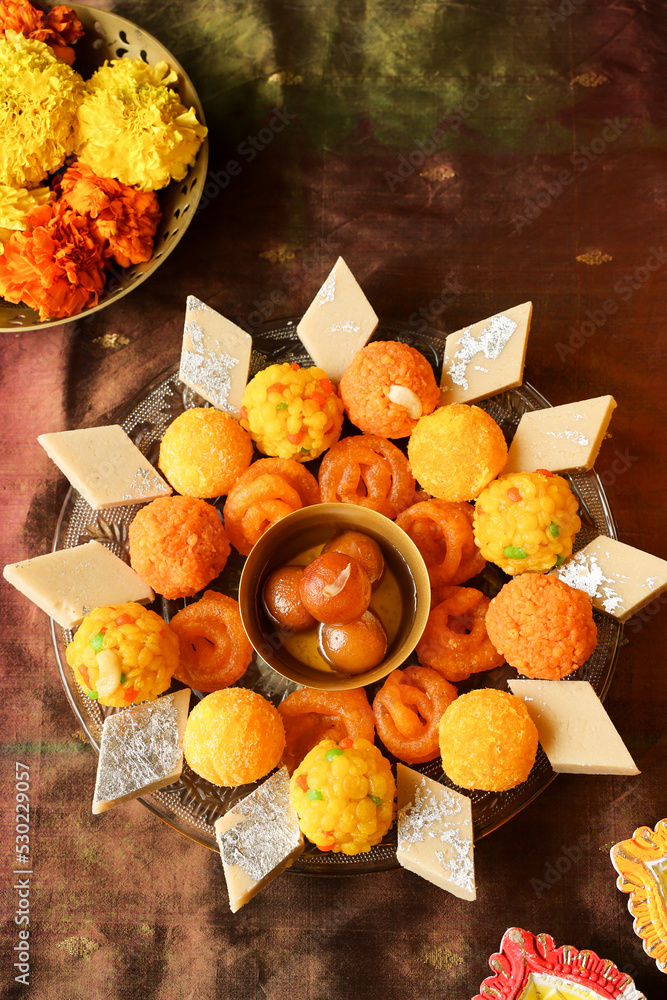 Diwali sweets Mango chum chum barfi petha Laddu Jalebi peda Indian ...