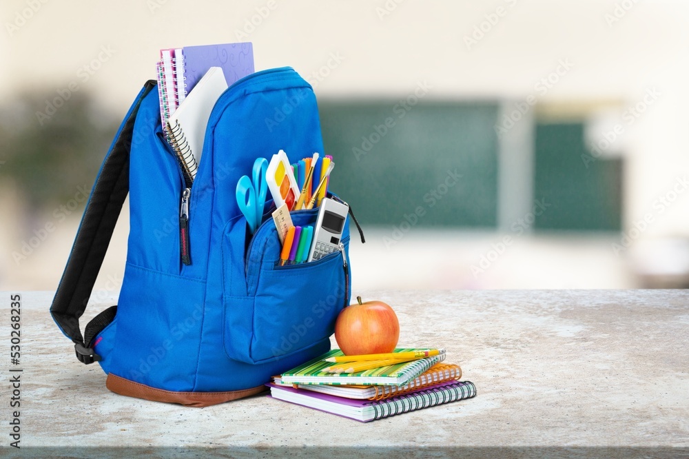 School classroom. New school bag on a student's desk in the classroom ...