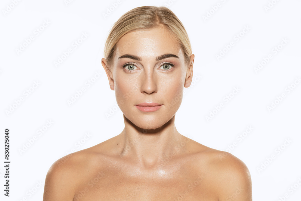 Young, beautiful 35 years old woman with well-kept skin isolated on ...