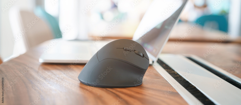 ergonomic mouse on desk at workplace, prevention wrist pain because ...