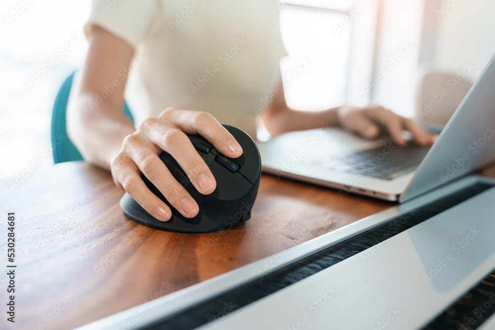 woman hand using computer ergonomic mouse, prevention wrist pain ...