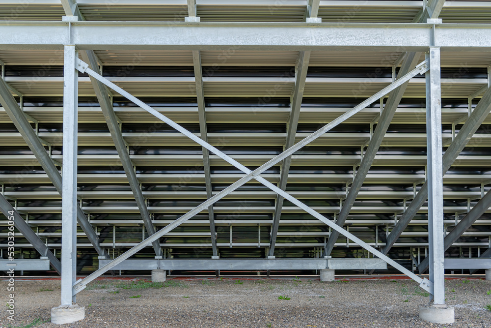 Straight on view of under stadium bleachers, steal I-Beam bleachers ...