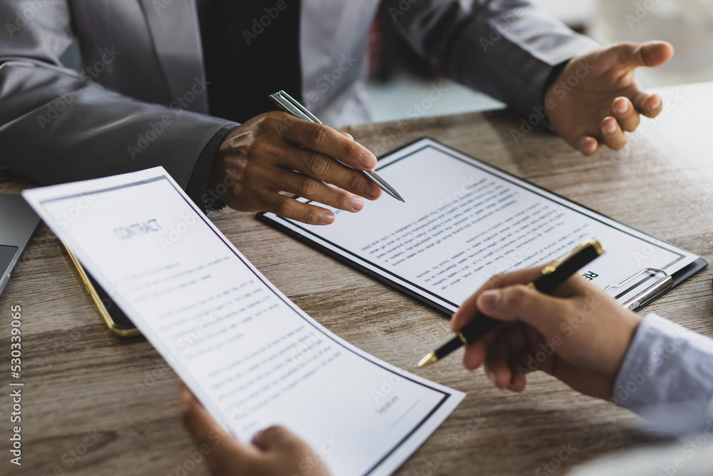 Job interview and signing of employment contract documents. ภาพถ่าย ...