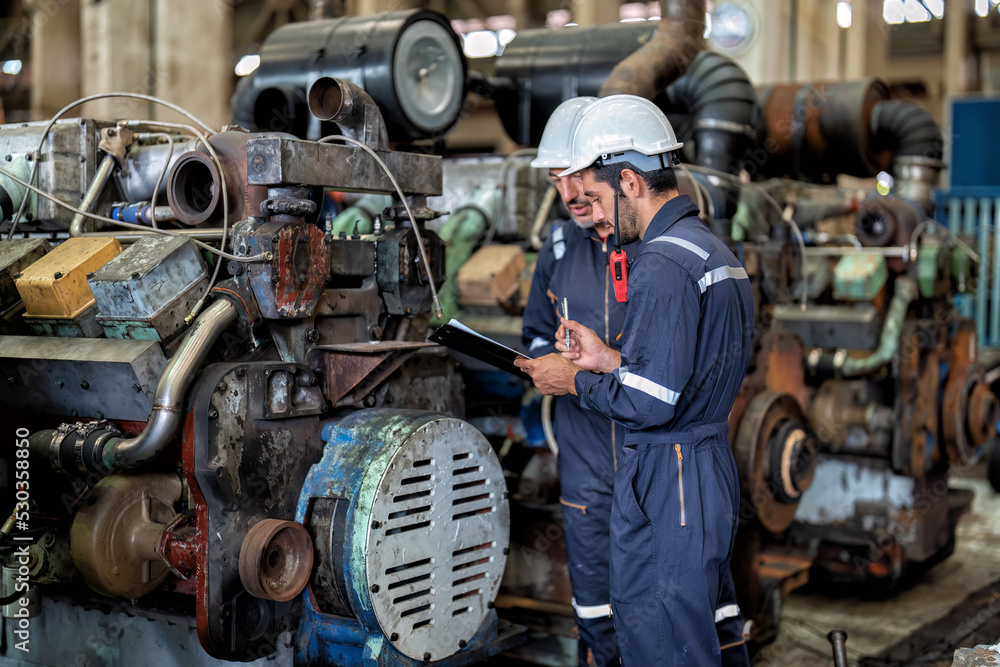 In heavy industry maintenance manager meet engineer checking and ...