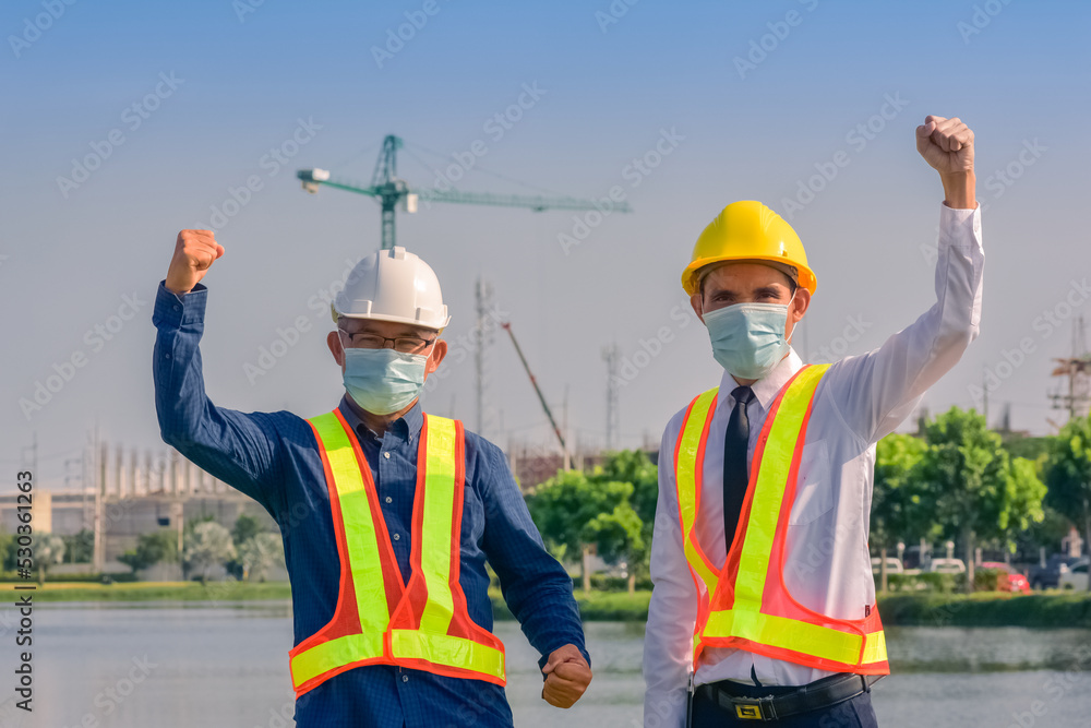 Team Asian man architect on a building construction site Stock Photo ...