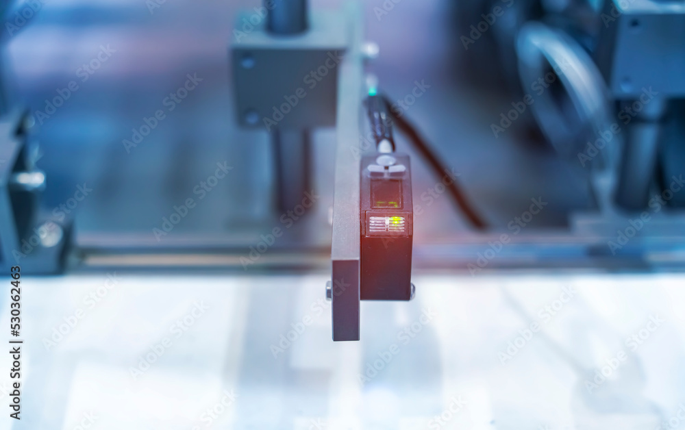 transducer on industrial machine robot in assembly line working in ...