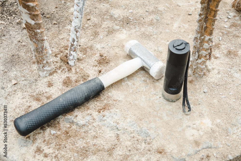 Construction works. Seismic test on concrete pile. Engineer using the ... Construction works. Seismic test on concrete pile. Engineer using the ...