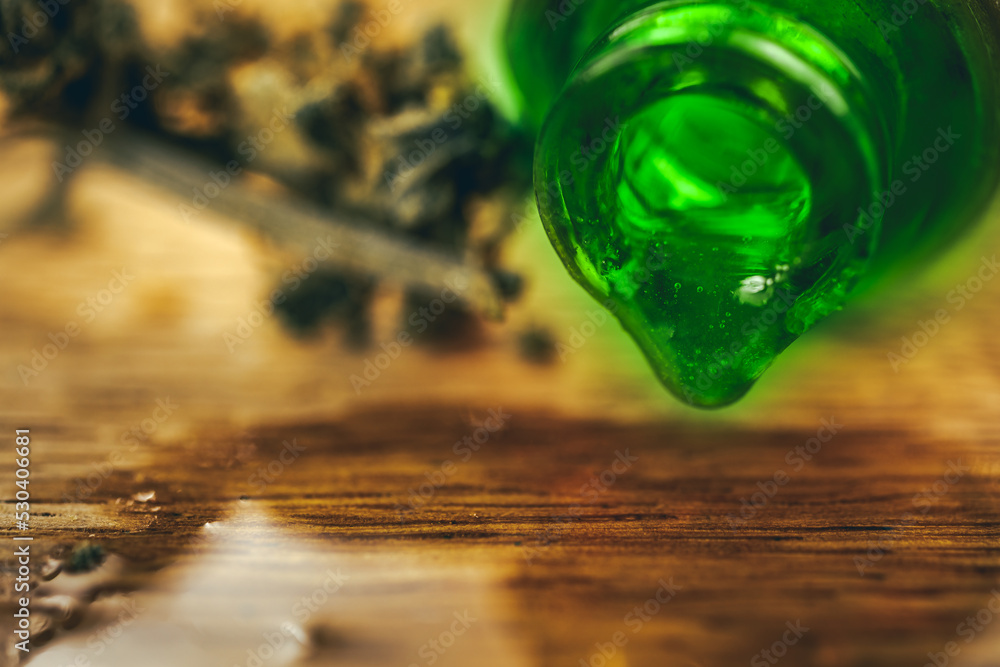 Cannabis flowers on the oak piece of wood background with small and old ...