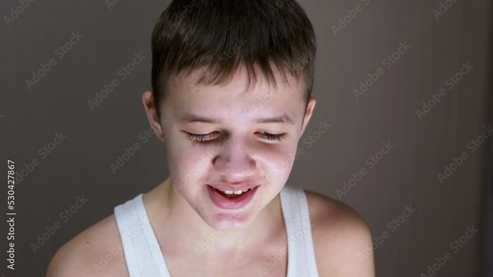 Close-up of a Face Profile of Talking Smiling Teenager Looking Down ...