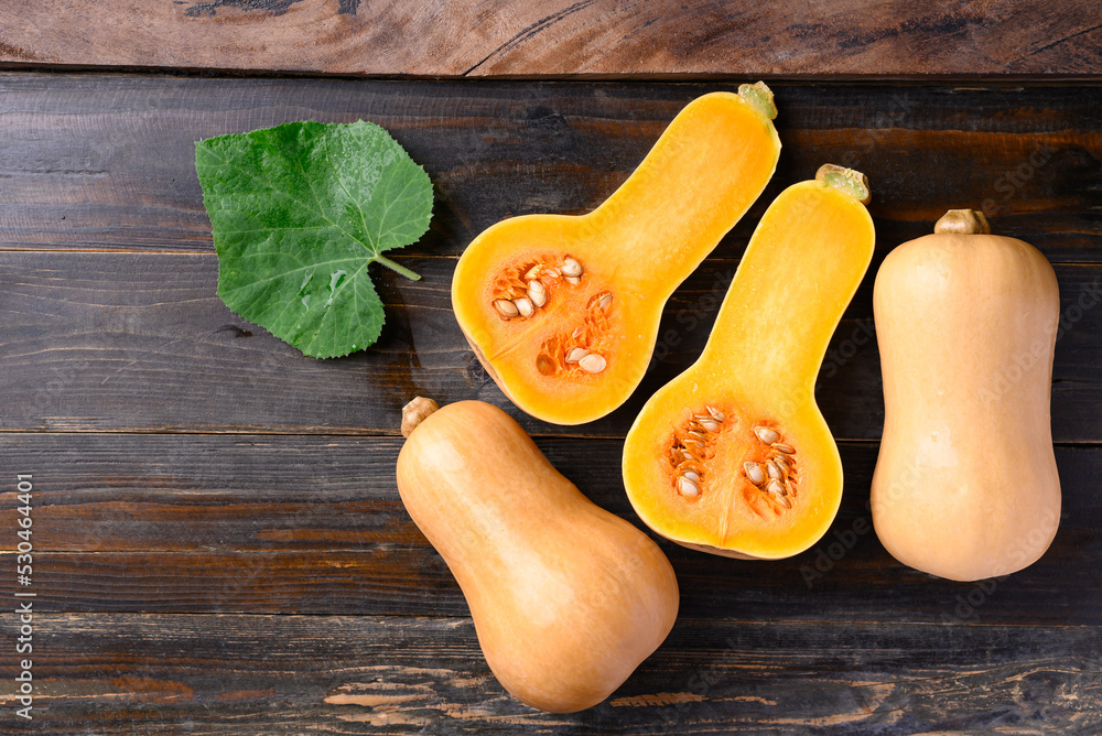 Butternut squash or butternut pumpkin on wooden background, Table top ...