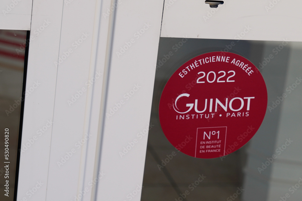 guinot label 2022 sign text and brand logo on wall facade beauty ...