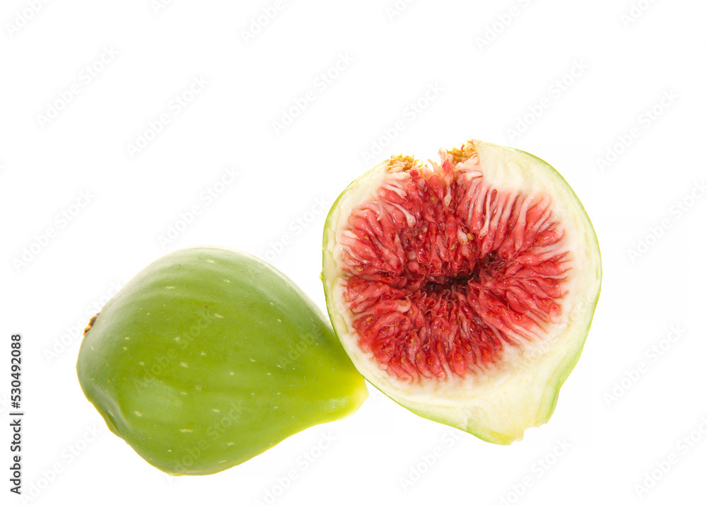 Fresh fig split in half before ripening, swollen unripened fruit ...