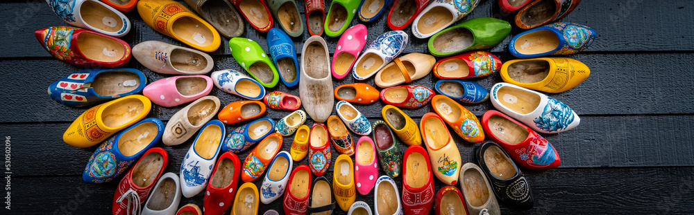 Clogs for sale at a Dutch retail shop. Wooden shoes are a well know ...