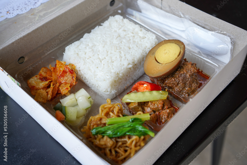 Serving rice boxes in white boxes from cardboard or paper boxes. White ...