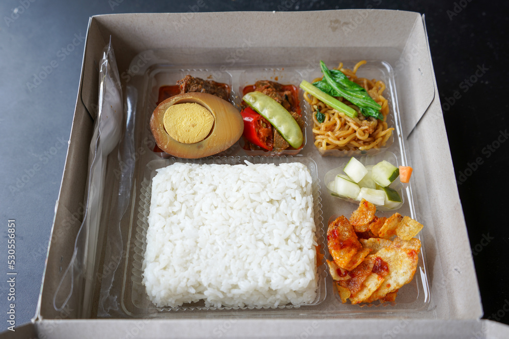 Serving rice boxes in white boxes from cardboard or paper boxes. White ...
