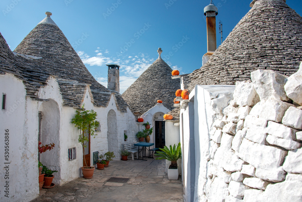 typical trulli houses in Alberobello, Puglia, Italy. Traditional ...