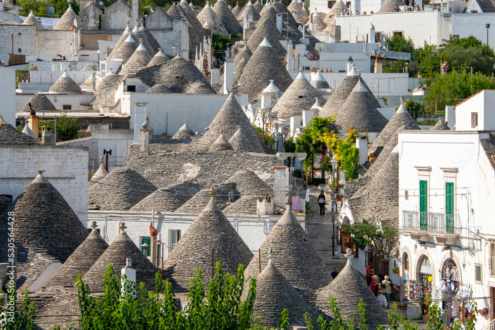 typical trulli houses in Alberobello, Puglia, Italy. Traditional ...