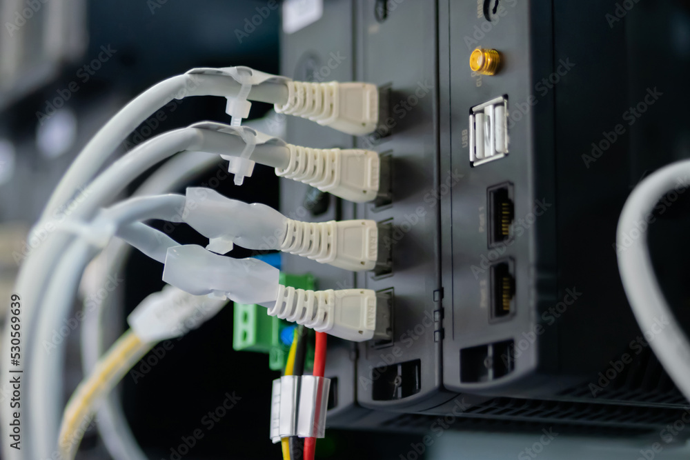 Telecommunication technology equipment - fiber optic cables and switch ...