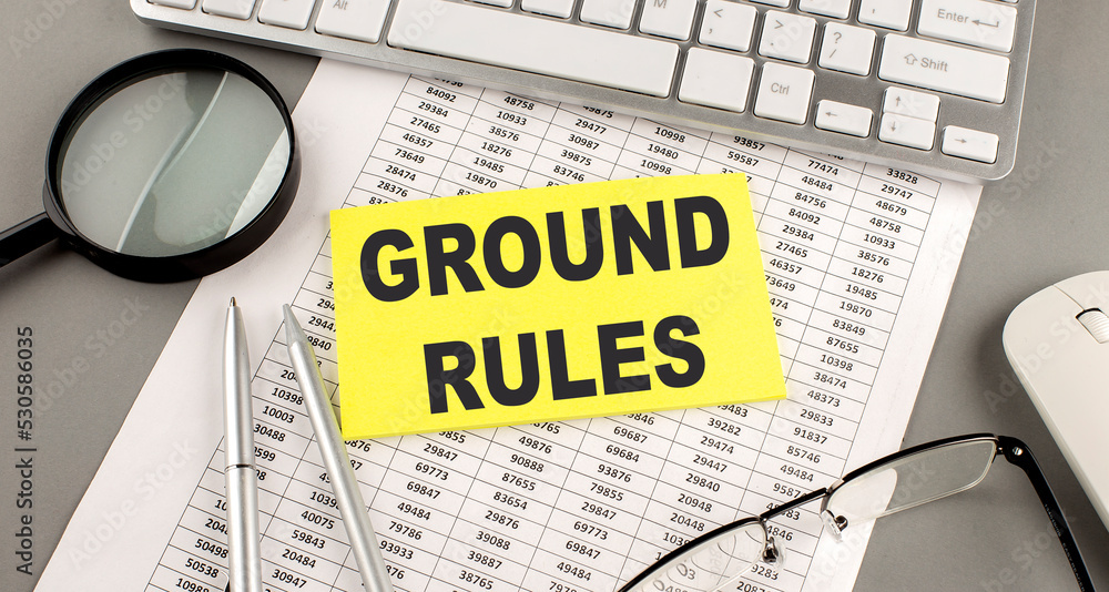 GROUND RULES text written on a sticky on chart with keyboard and ...
