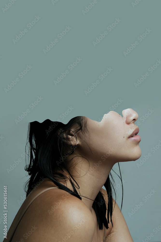 half Portrait of a beautiful Asian girl in profile with wet hair ...
