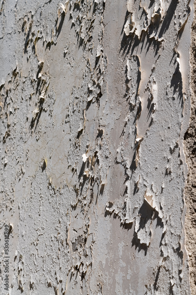 House Wall with old white color cracked and weathered on the facade of ...
