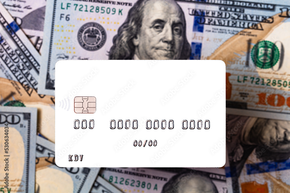 Transparent debit card and US 100 dollar banknote Stock Photo | Adobe Stock