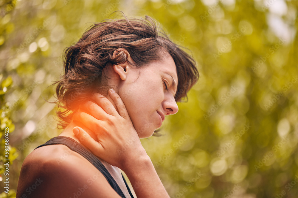 Woman, injury and neck pain from a workout with muscle strain and ...