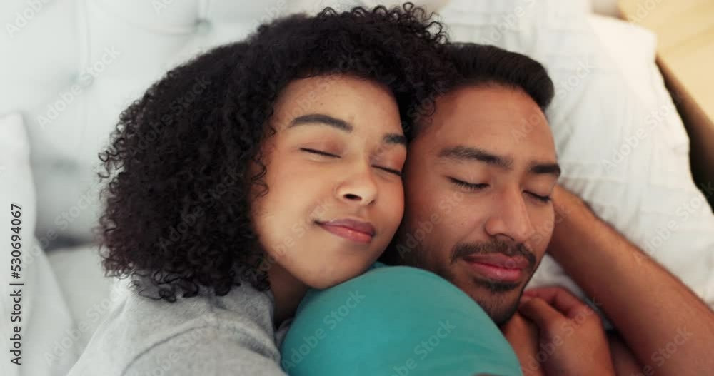 Love, hug and relax couple sleep in bed together cuddle, happy and ...
