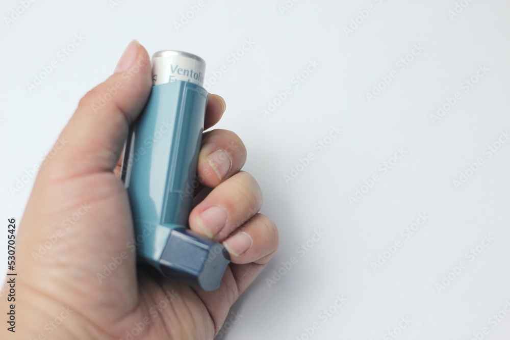 Bangkok, Thailand - September 2022 : Man's hand holding an asthma ...