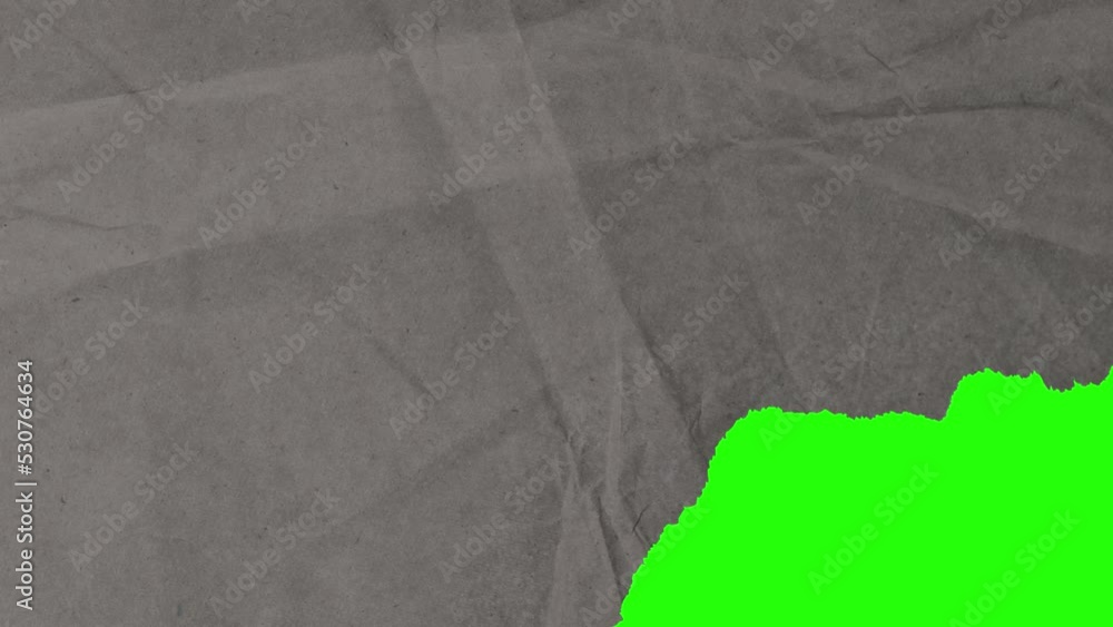 Torn off bottom right corner of a recycled paper. Green screen. vídeo ...