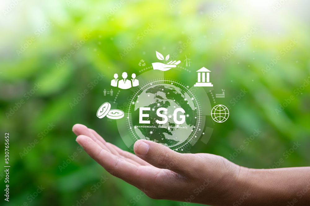 ESG text and Environmental concept in hand of human, social, and ...