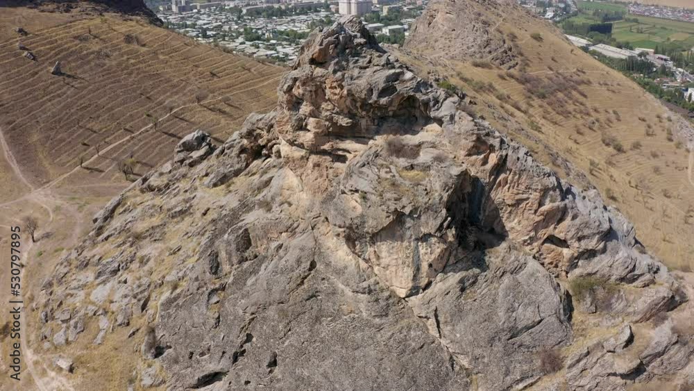 Close-up of one of the rocky peaks of the sacred mountain Sulaiman-Too ...