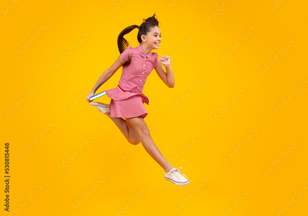 Schoolgirl with copy book posing on isolated background. Literature ...