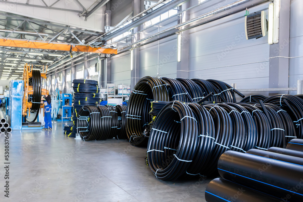 warehouse of plastic pipes in the factory Stock Photo | Adobe Stock