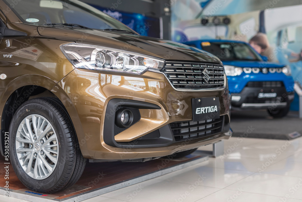 Manila, Philippines - Sept 2022: A Suzuki Ertiga minivan and S-Presso ...