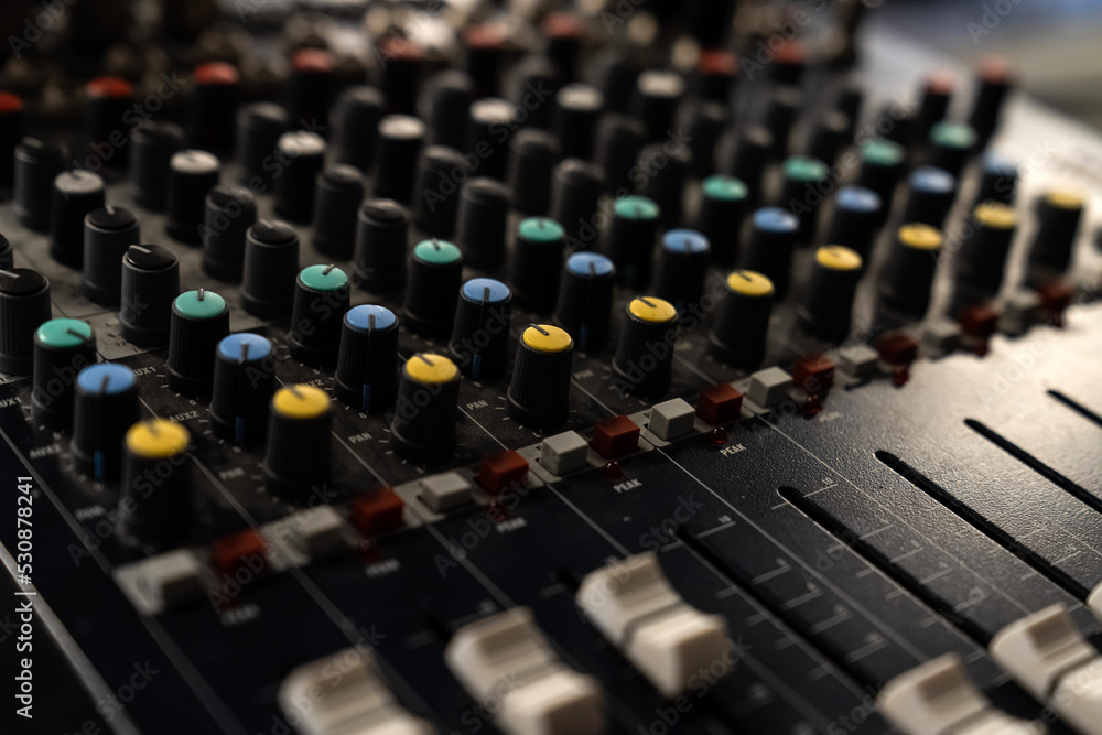 controls on an audio mixer, Sound mixer. Professional audio mixing ...