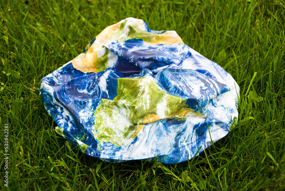 deflated planet Earth balloon, global warming and climate change ...