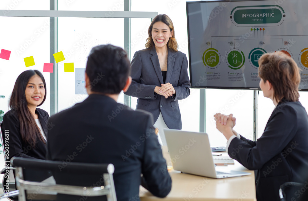 Millennial Asian successful professional businesswoman presenter ...