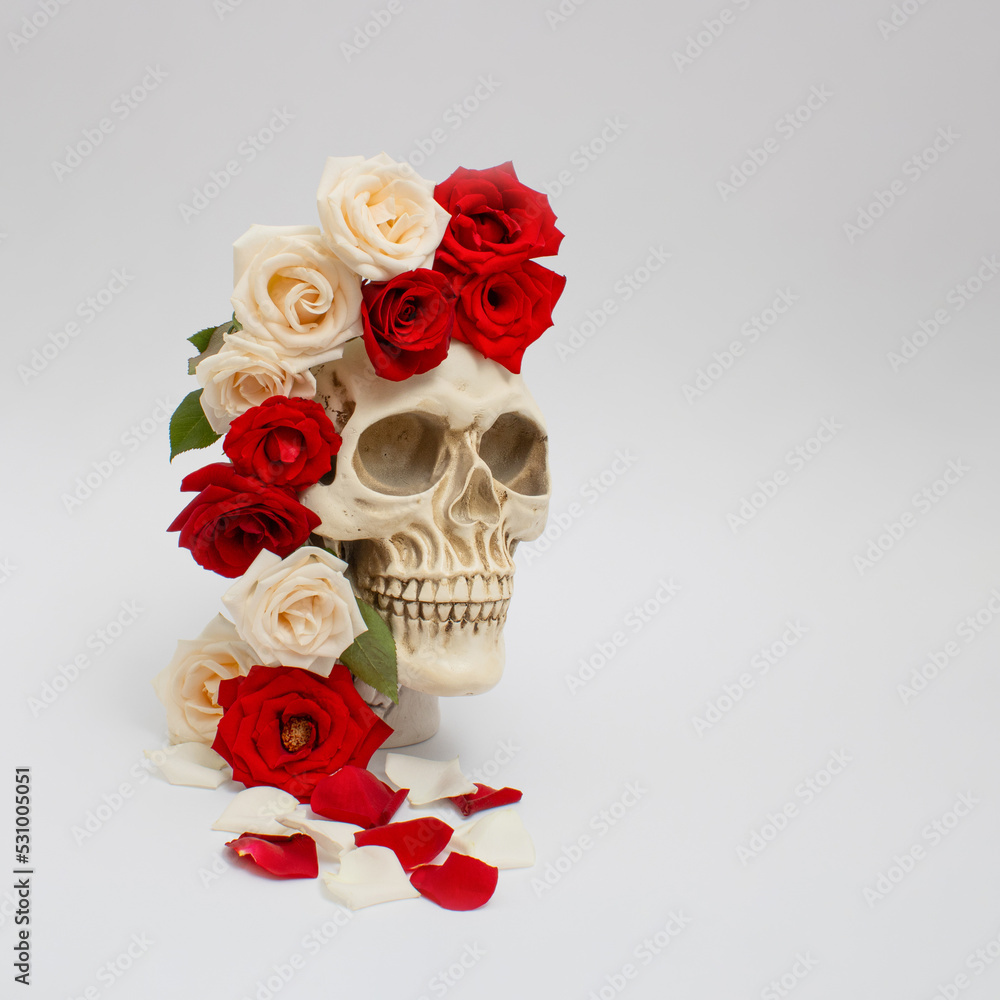 Realistic human skull with red and pink roses. Aesthetic love or ...