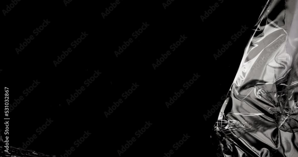 Plastic Texture. The film is torn on a black background. Stock-Video ...