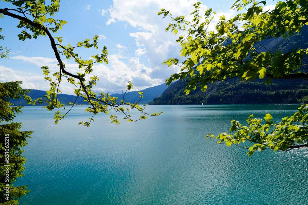 emerald-green waters of Walchensee or Lake Walchen, one of the deepest ...