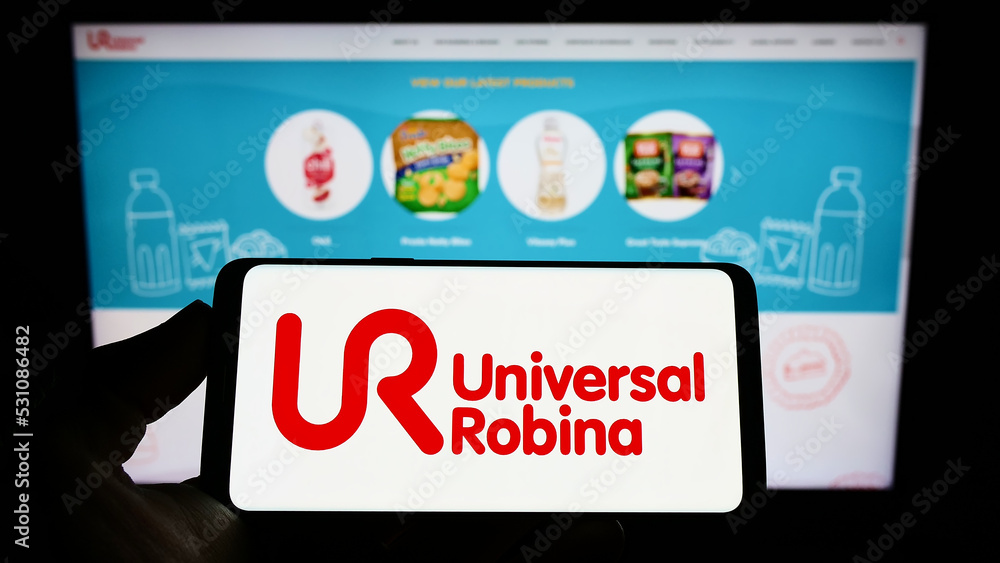 Stuttgart, Germany - 09-10-2022: Person holding mobile phone with logo ...