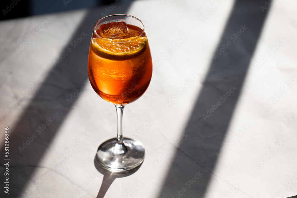 photography of aperol spritz cocktail glass with orange slice photo ...