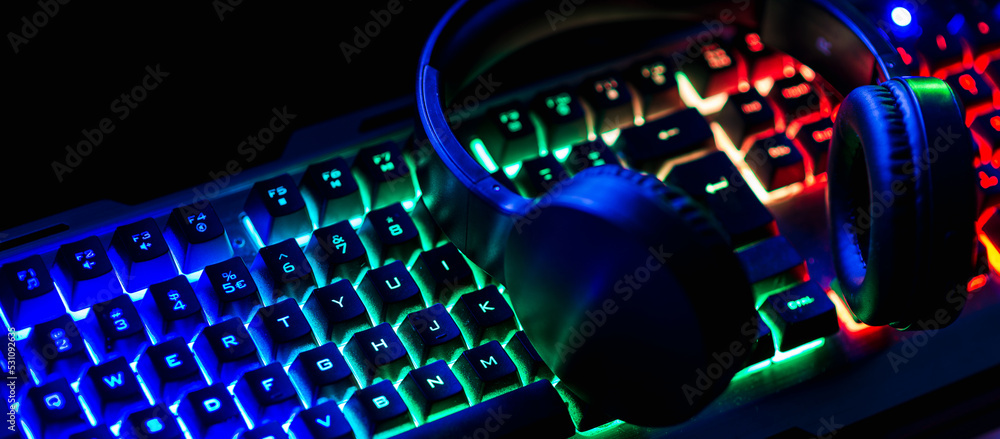 Pro gaming illuminated desk, headset, keyboard, computer neon lights ...