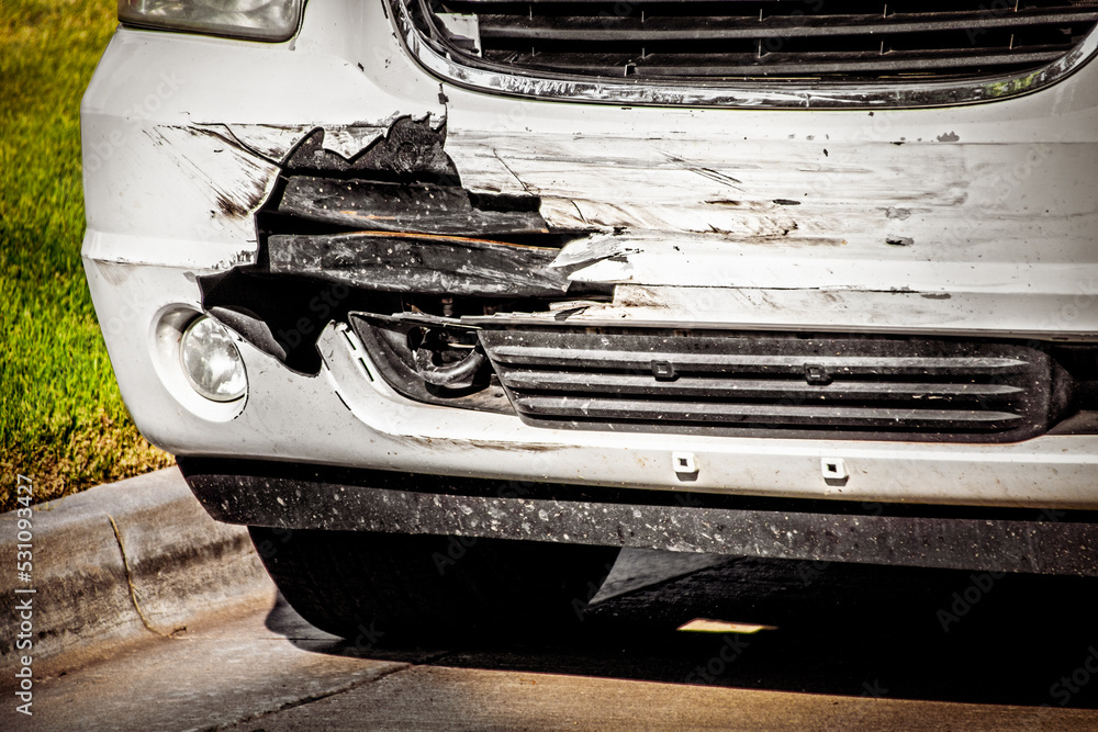 Wrecked white SUV front with outside shell of vehicle torn off to ...