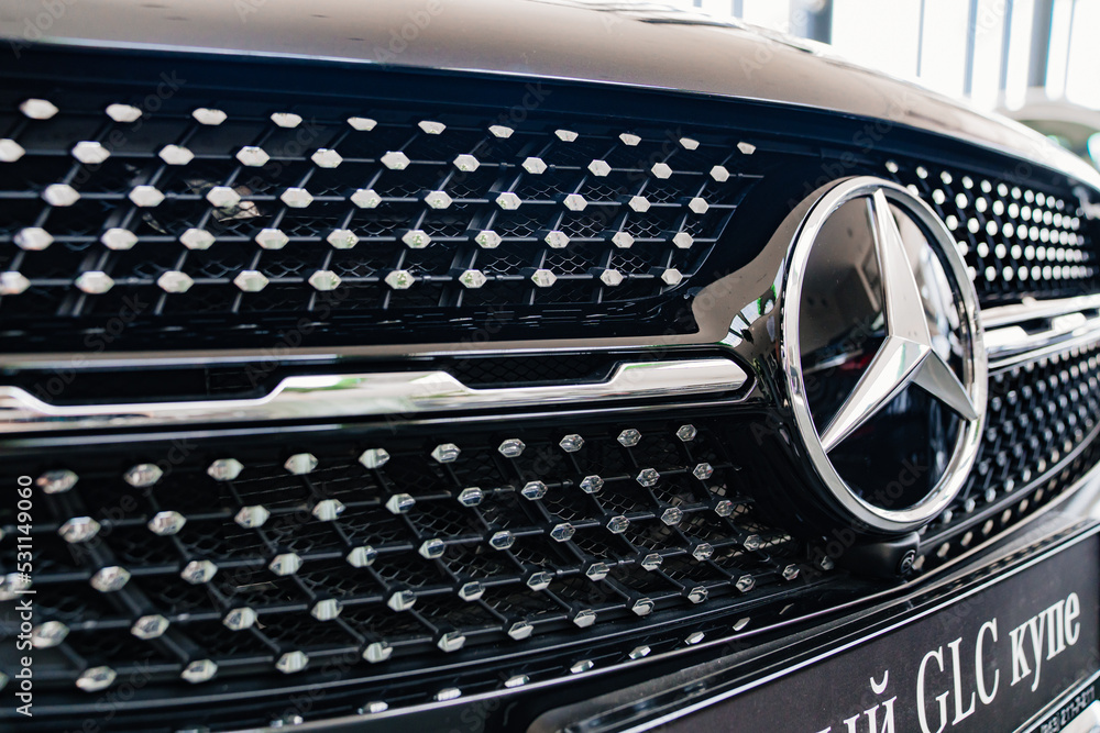 grid radiator and logo. a black Mercedes GLC car. luxury cars. Stock ...