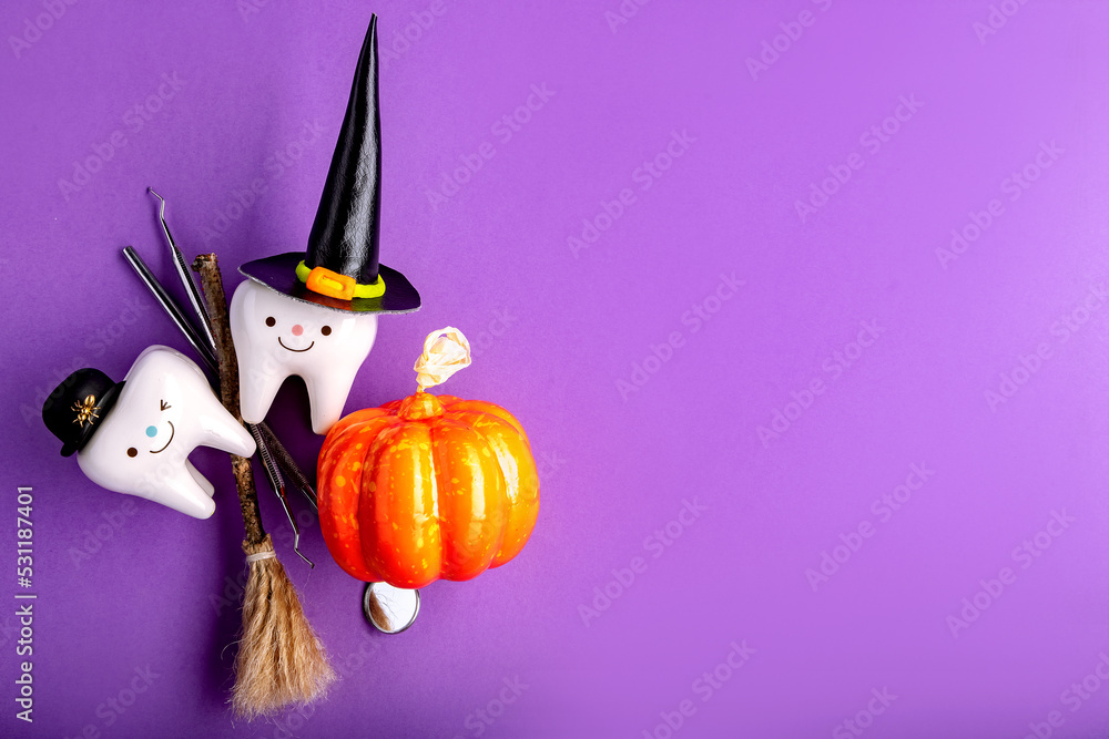 dental concept. figurines of teeth in halloween costumes and dental ...