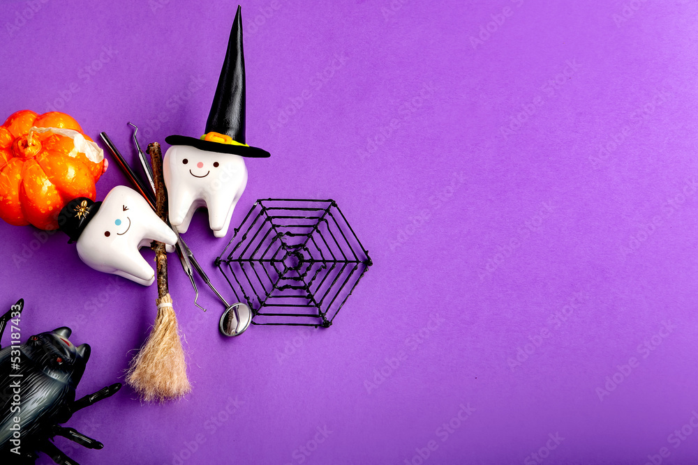dental concept. figurines of teeth in halloween costumes and dental ...