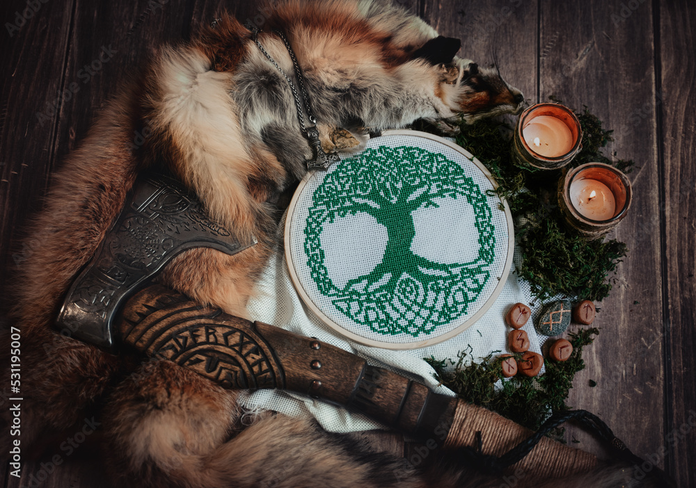 The yggdrasil tree from Scandinavian mythology is embroidered on a ...