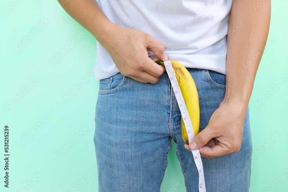 Size matters concept and penis size measurement. Young Asian man ... Size matters concept and penis size measurement. Young Asian man ...